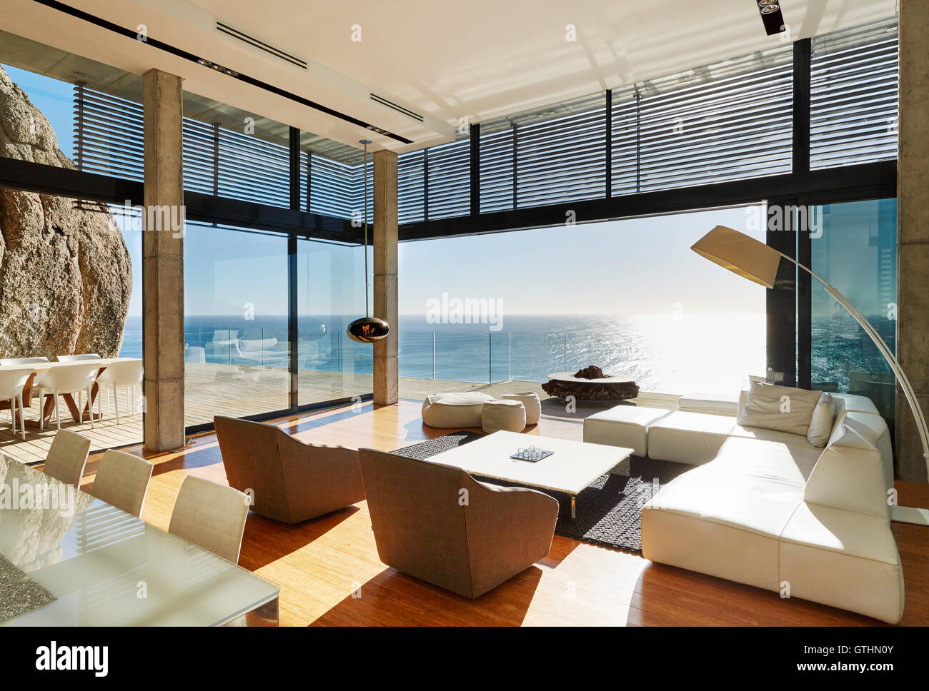 Modern luxury home showcase living room with sunny ocean view Stock ...