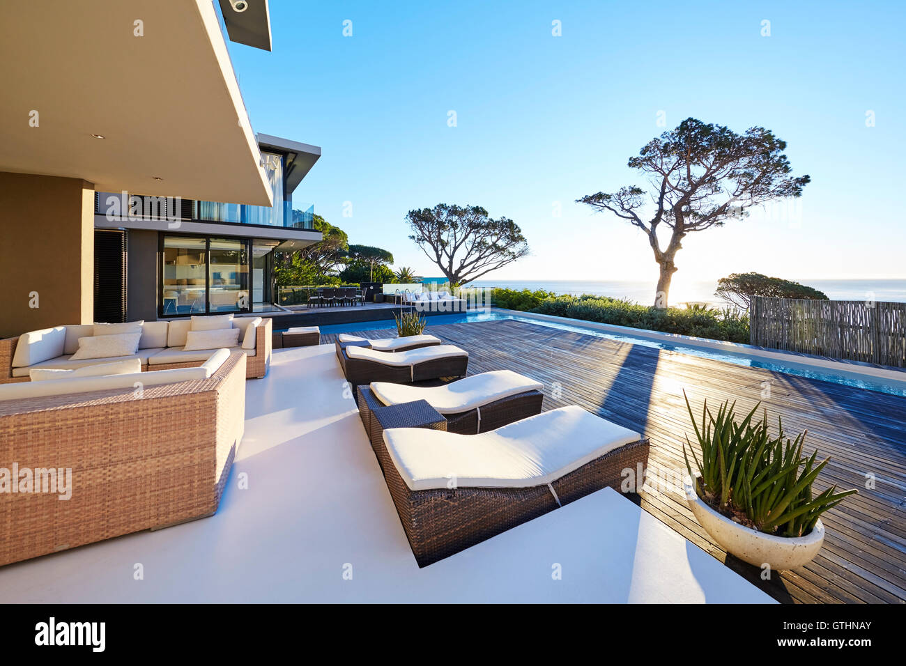 Modern luxury home showcase patio with ocean view Stock Photo - Alamy