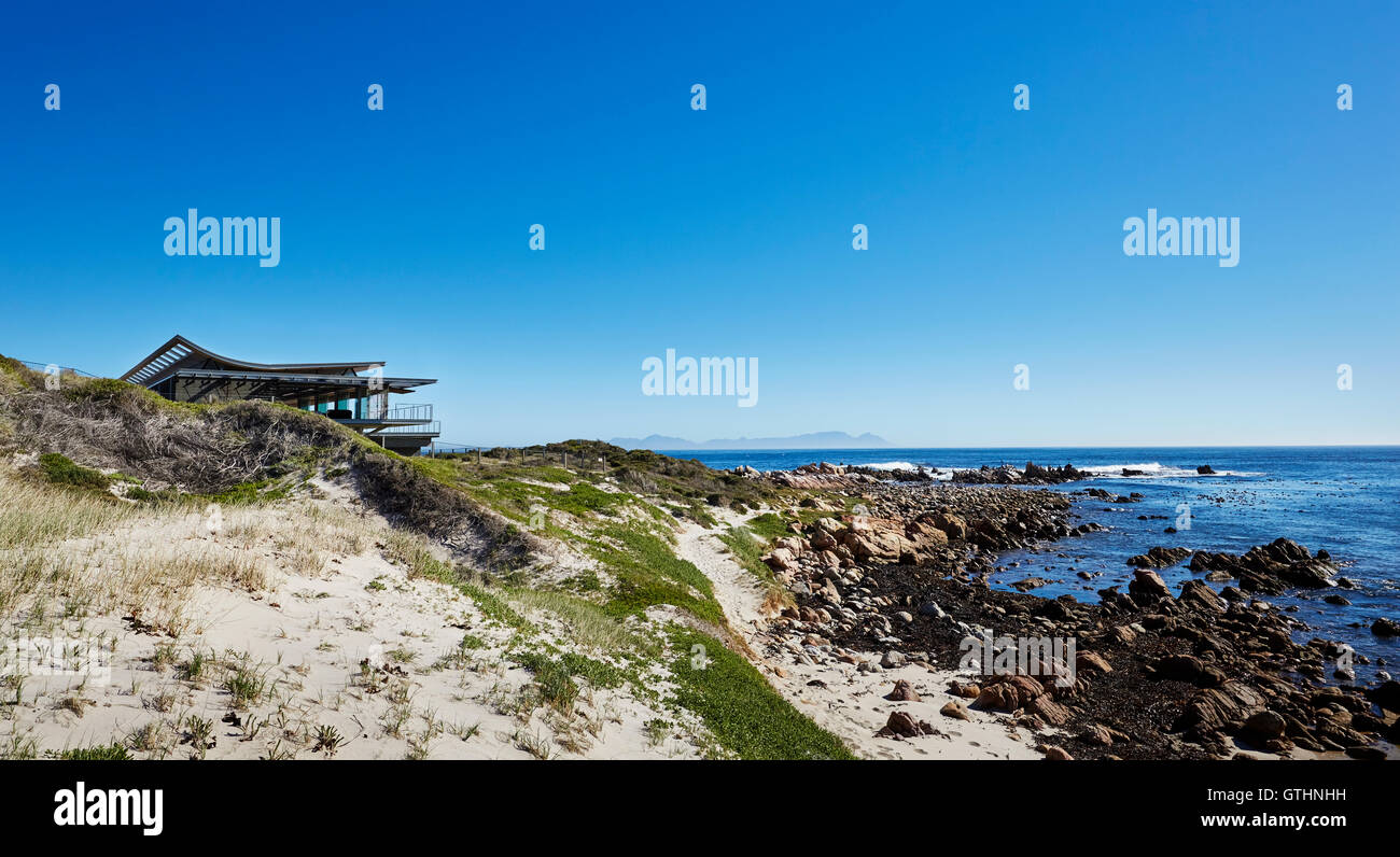 House with ocean view under sunny blue sky Stock Photo - Alamy