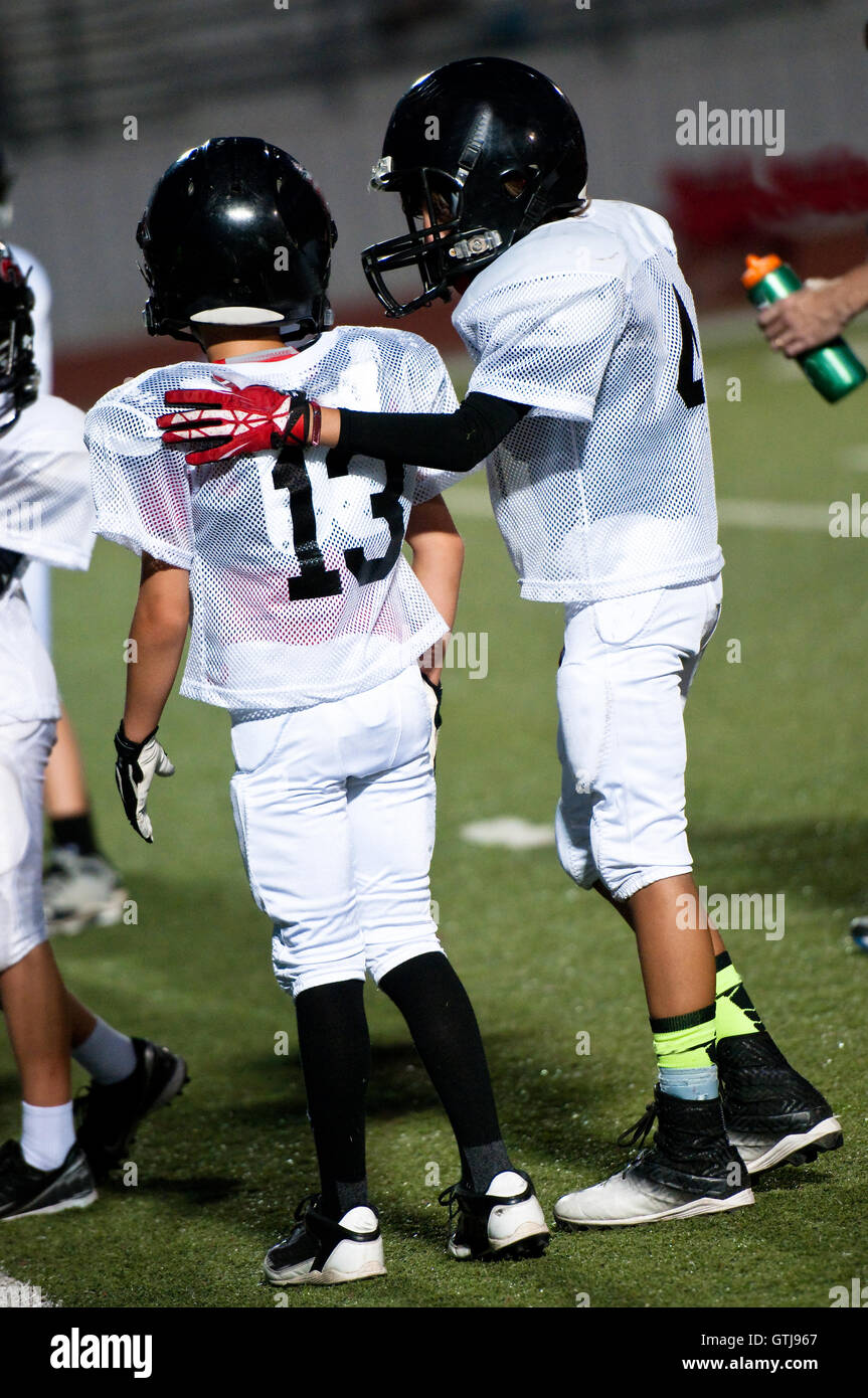 Young american football teammates Stock Photo - Alamy