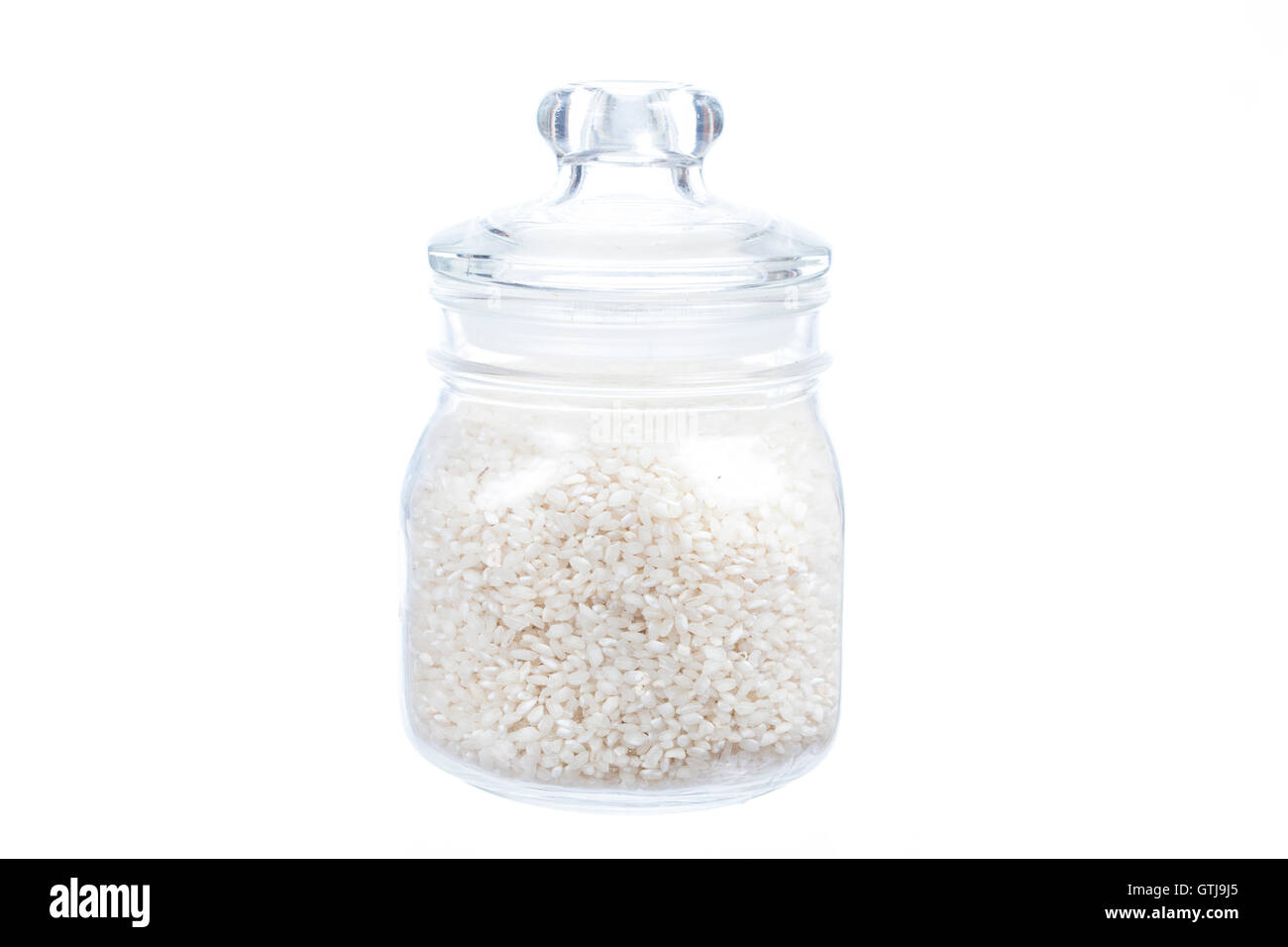 Closeup of rice jar isolated on white background Stock Photo - Alamy