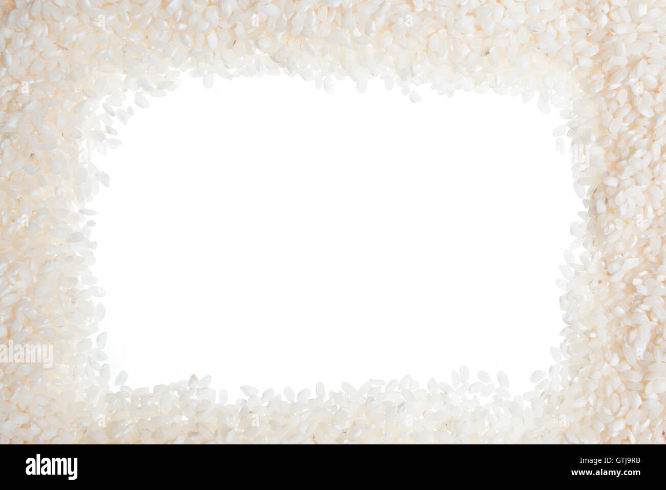 Raw rice frame with background on white Stock Photo - Alamy