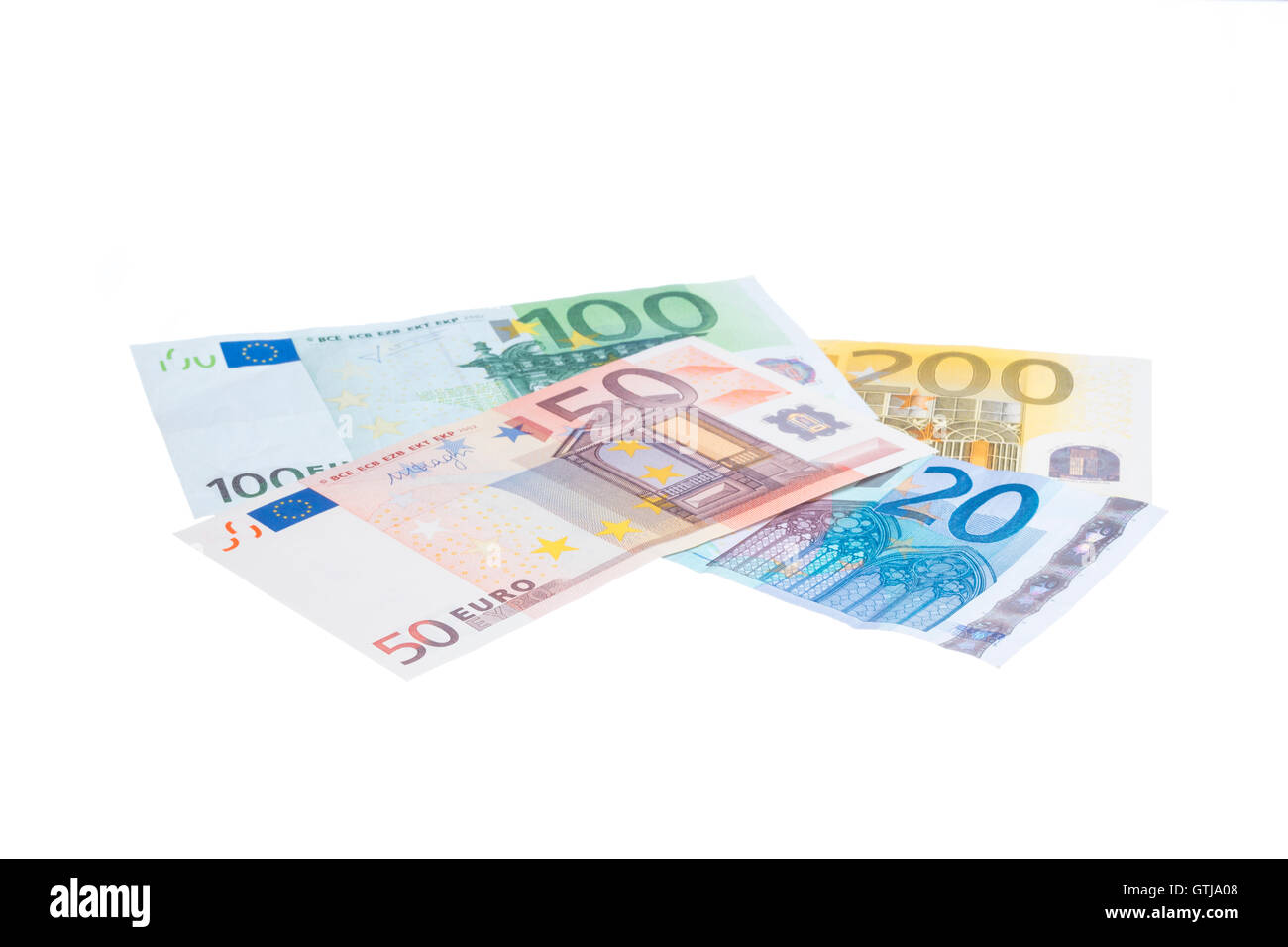 Closeup of different value euro banknote collection isolated on white ...