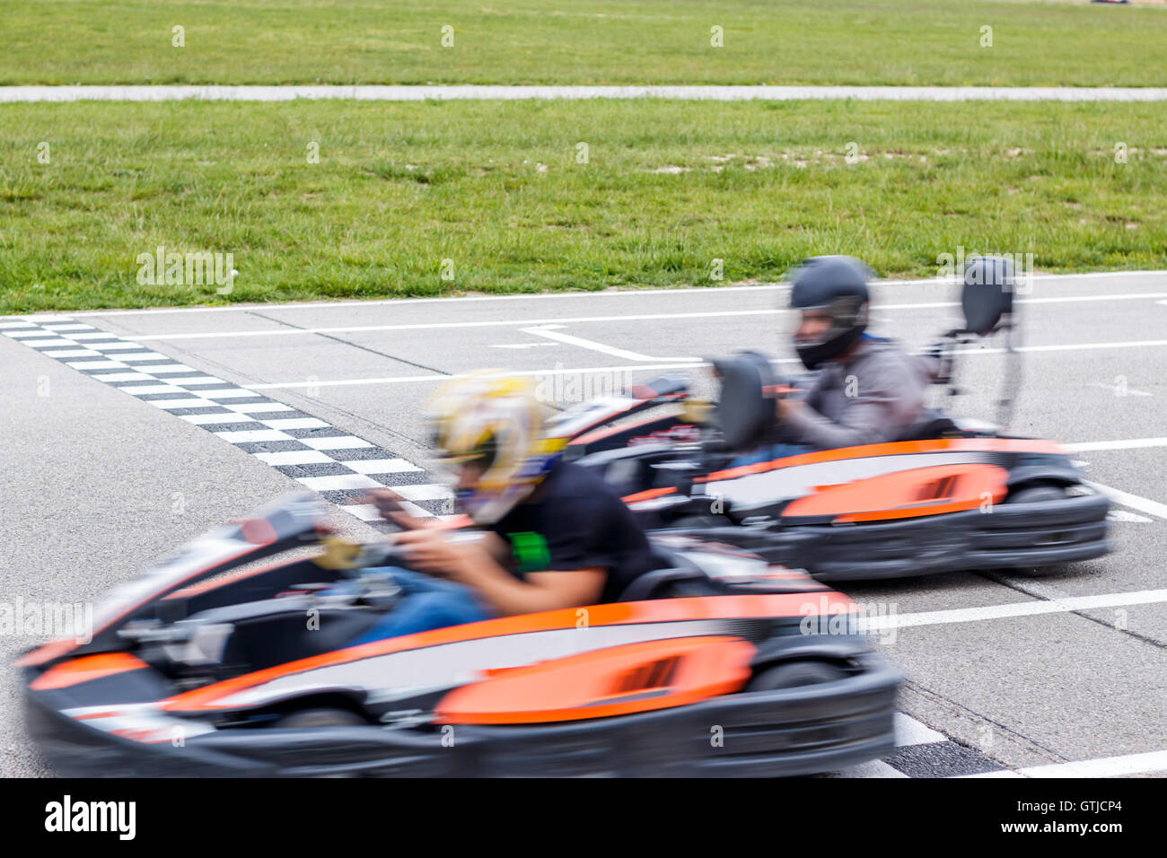 Two karts finishing the karting race in the line Stock Photo - Alamy