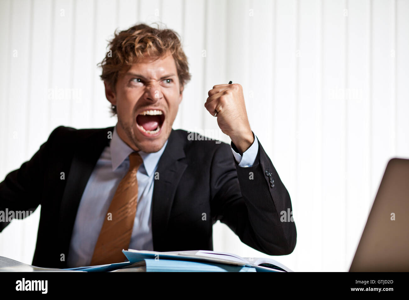 Angry businessman yelling Stock Photo - Alamy