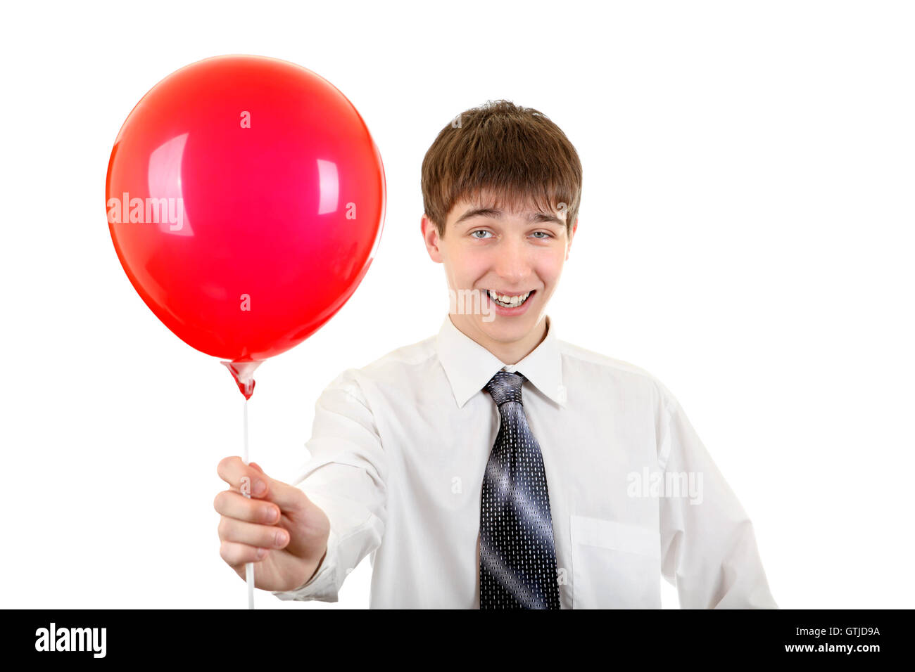 Young Man with Red Ball Stock Photo - Alamy