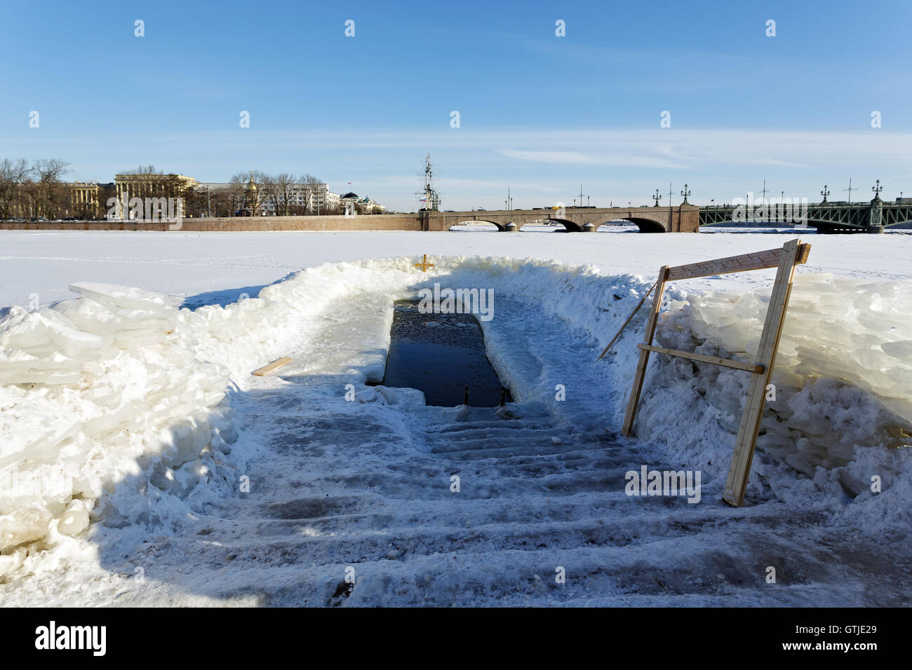 Ice-hole in Epiphany frosts Stock Photo - Alamy