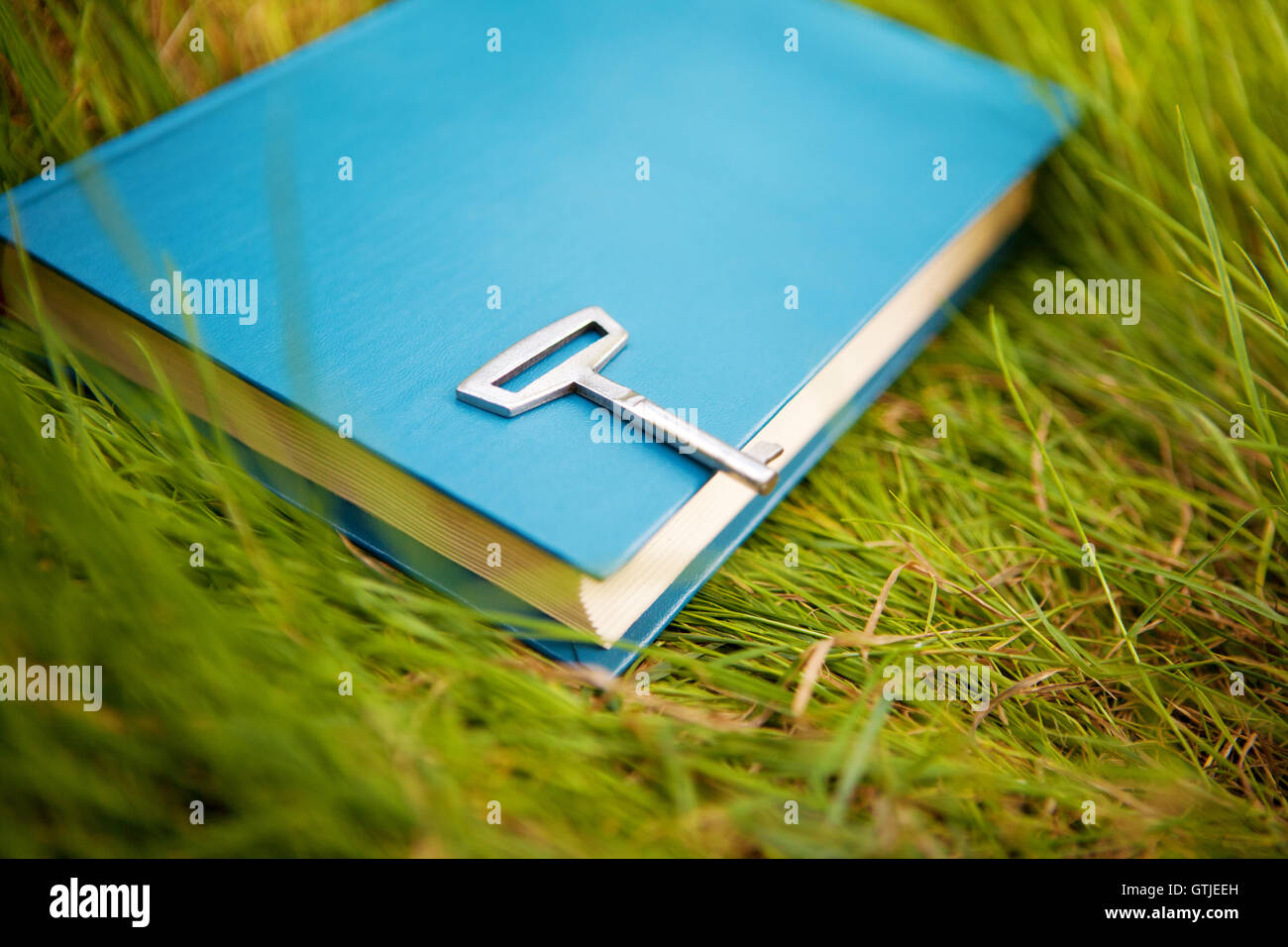 key on the book Stock Photo - Alamy