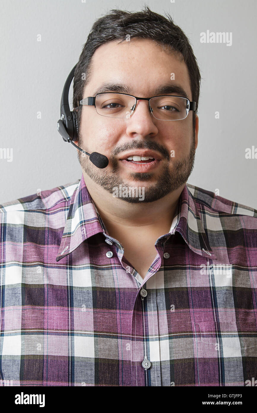 man talking on headset Stock Photo - Alamy
