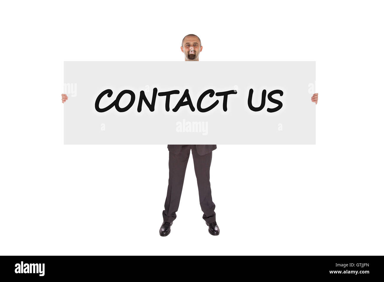 Business man showing large sign Stock Photo - Alamy