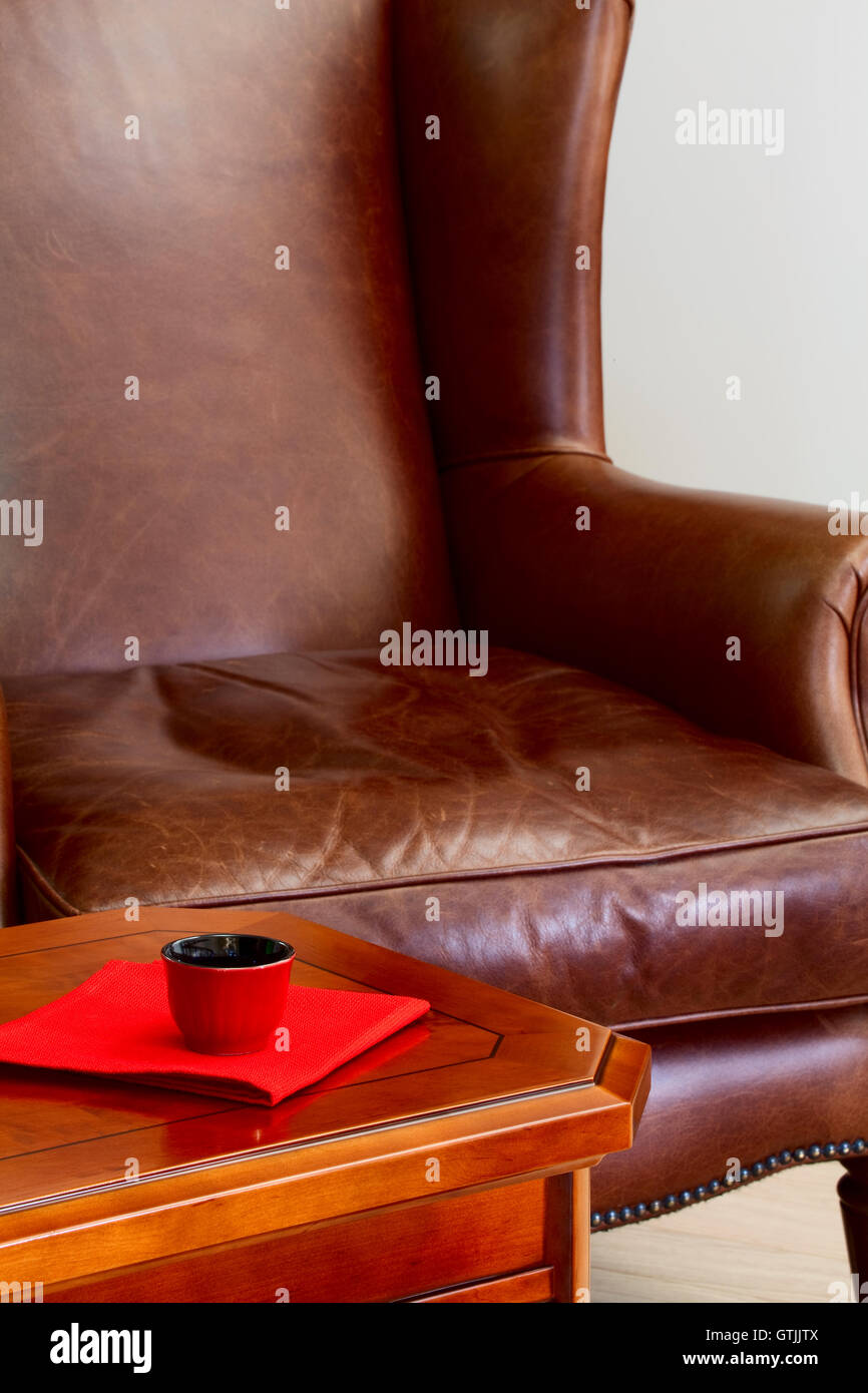 Vintage armchair and table hi-res stock photography and images - Alamy