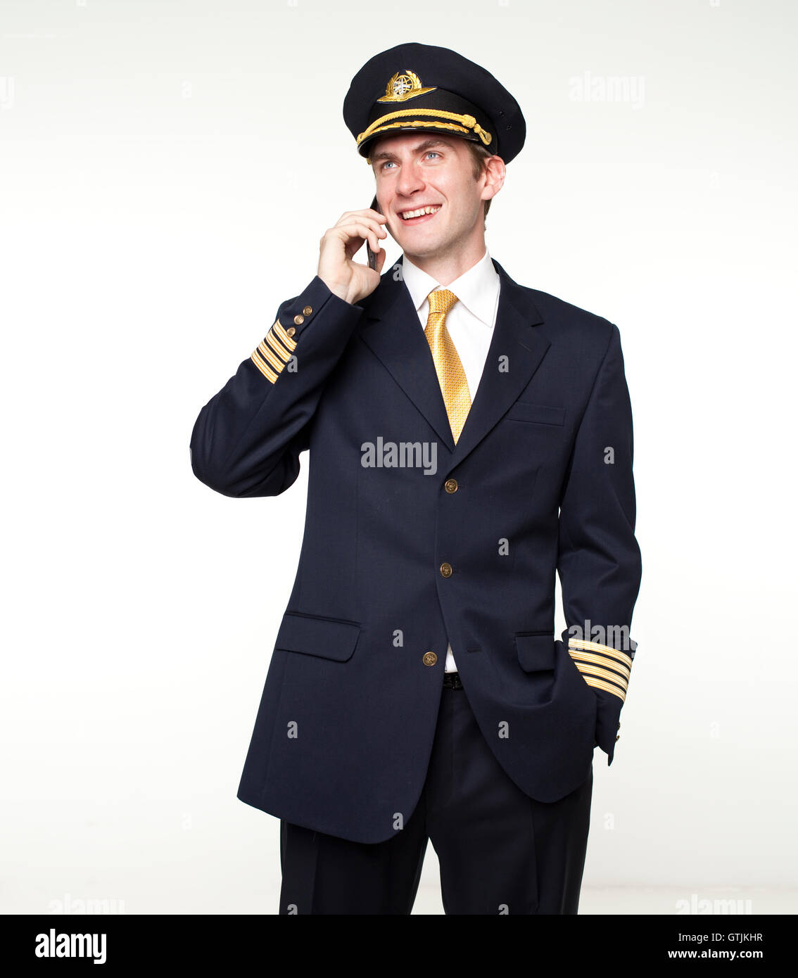 Young man in the form of a passenger plane pilot Stock Photo - Alamy