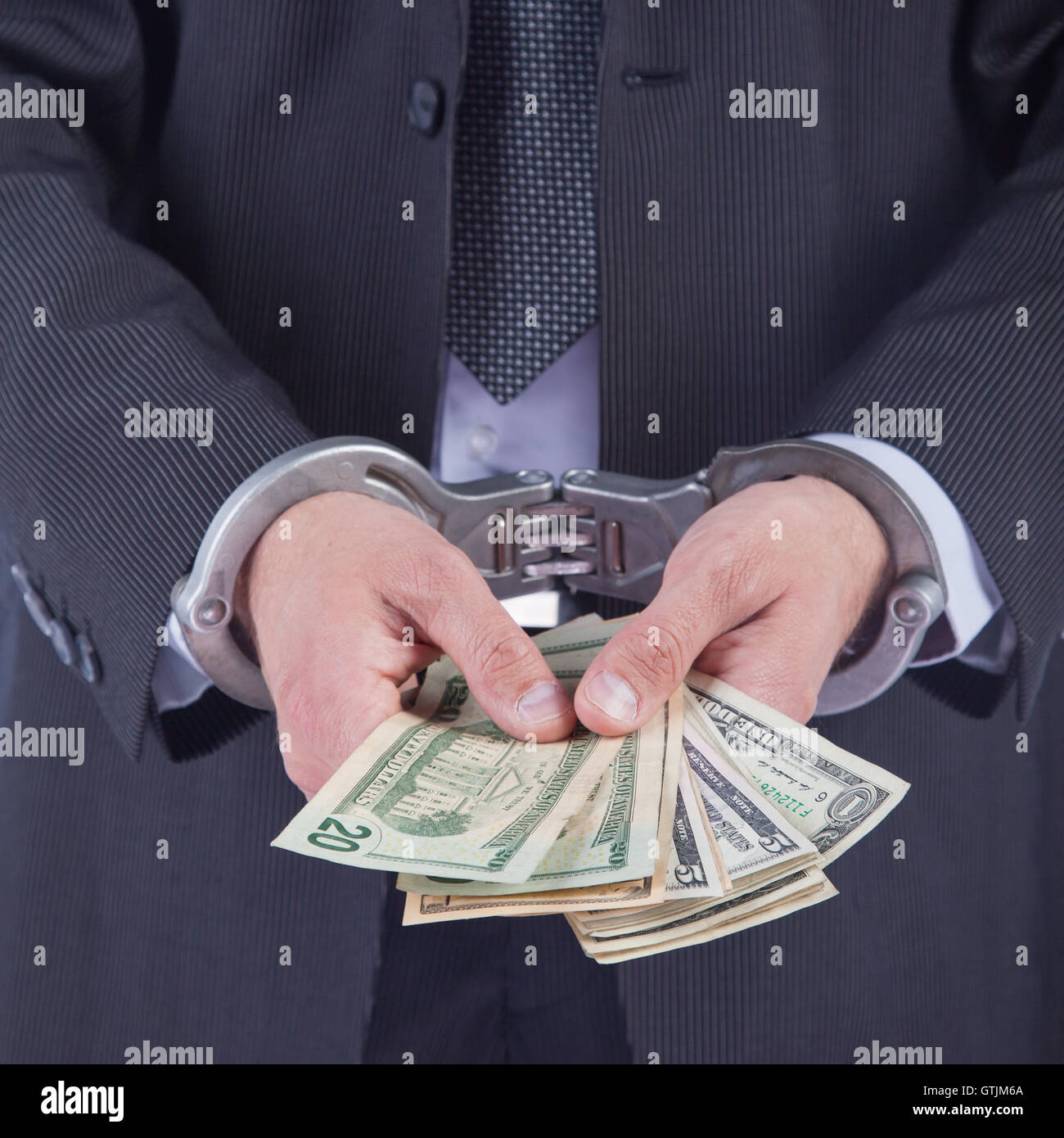 Business man in handcuffs arrested for bribe Stock Photo - Alamy Business man in handcuffs arrested for bribe Stock Photo - Alamy