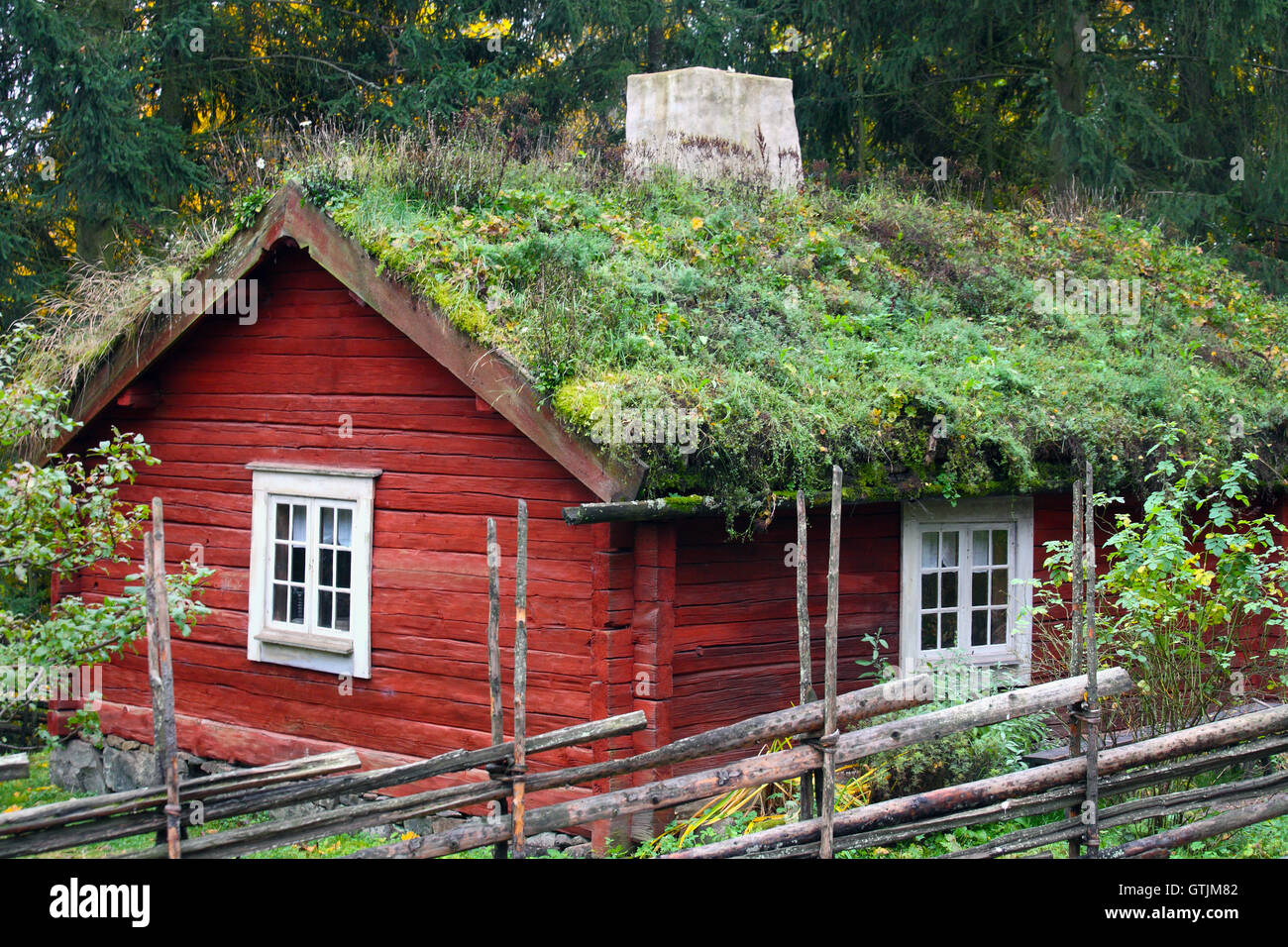 Small red cottage Stock Photo - Alamy