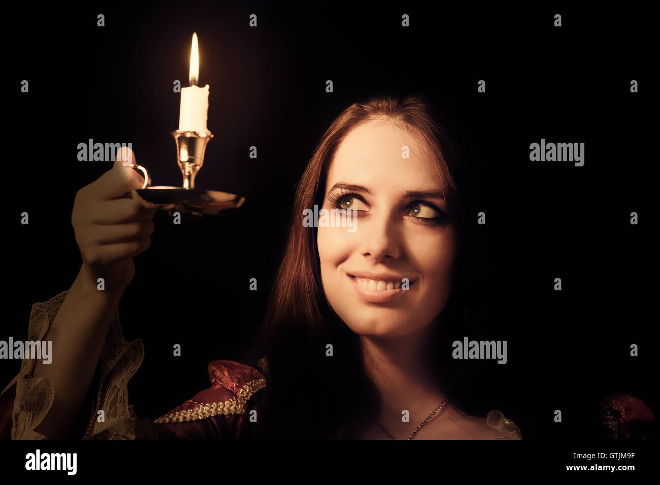 Girl with Candle Stock Photo - Alamy