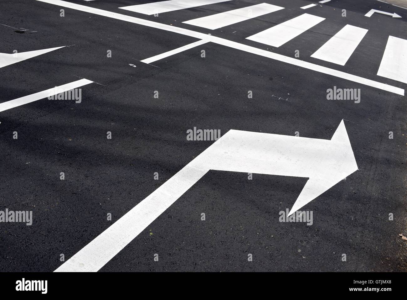 Traffic signs painted on the road Stock Photo - Alamy