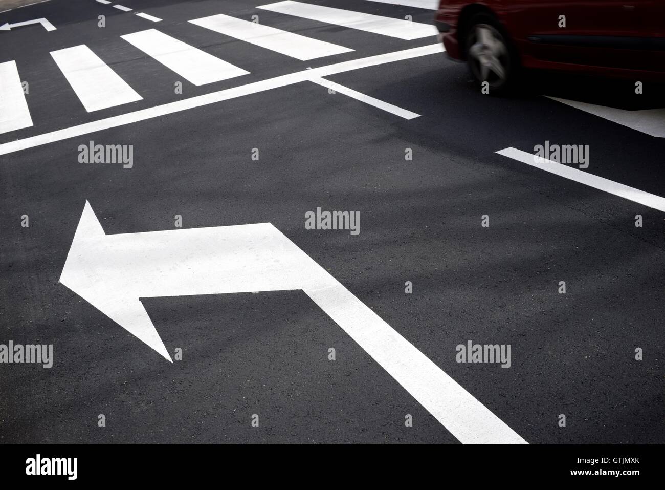 Traffic signs painted on the road Stock Photo - Alamy