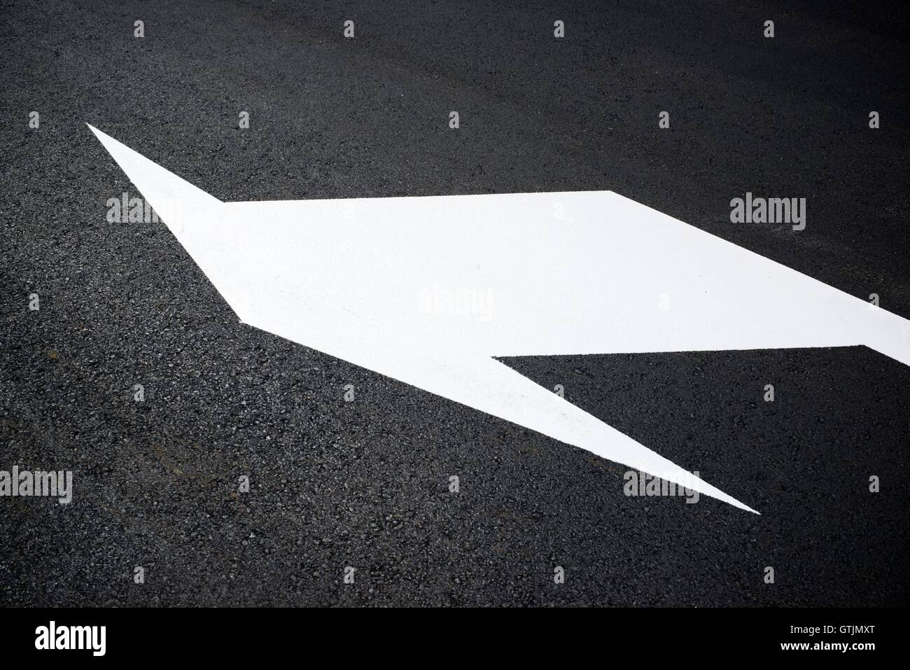 Directional arrow on ground hi-res stock photography and images - Alamy