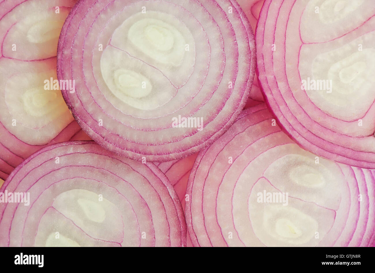 Slice of red onion, isolated Stock Photo - Alamy