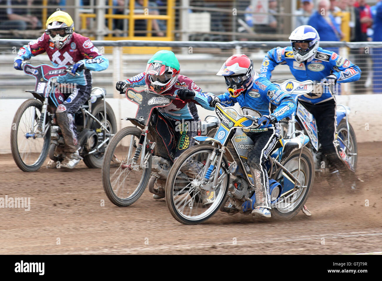 Heat 13: Jarek Hampel (red), Adam Shields (green), Piotr Swiderski ...