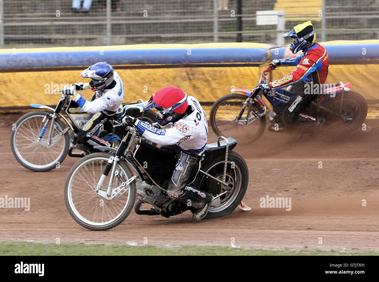 Heat 14: Chris Louis (red) and Jarek Hampel ahead of Andreas Jonsson ...