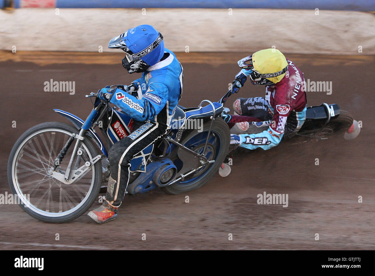 Heat 11: David Stachyra (blue) rides past as Kauko Nieminen (yellow ...