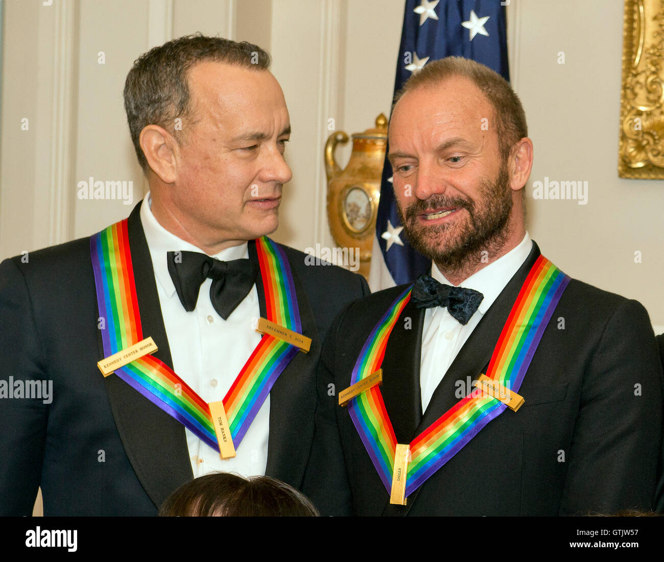 Singer-songwriter Sting, right, and actor and filmmaker Tom Hanks, left ...