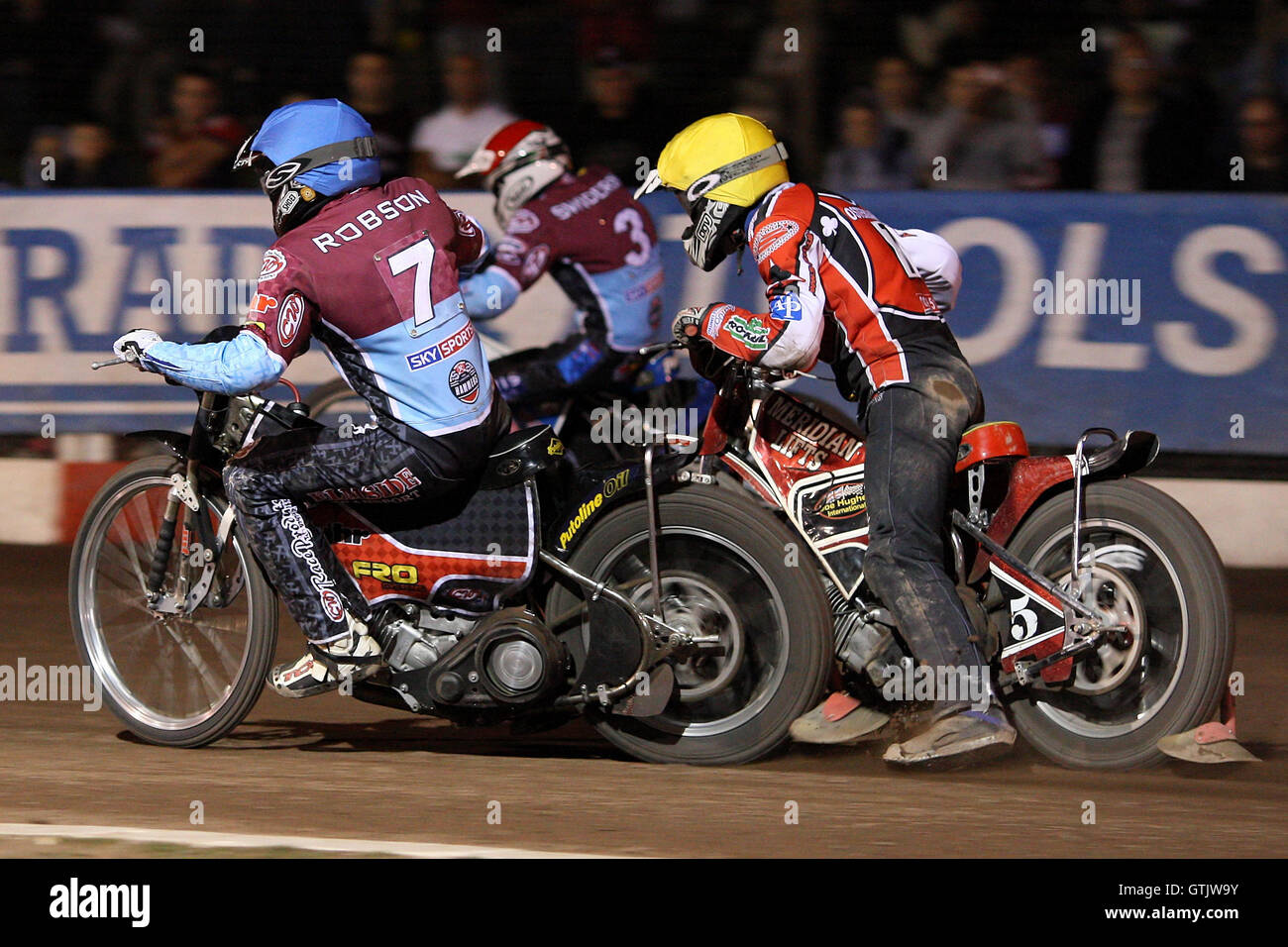 Heat 12: Stuart Robson (blue) makes a move to take second place from ...