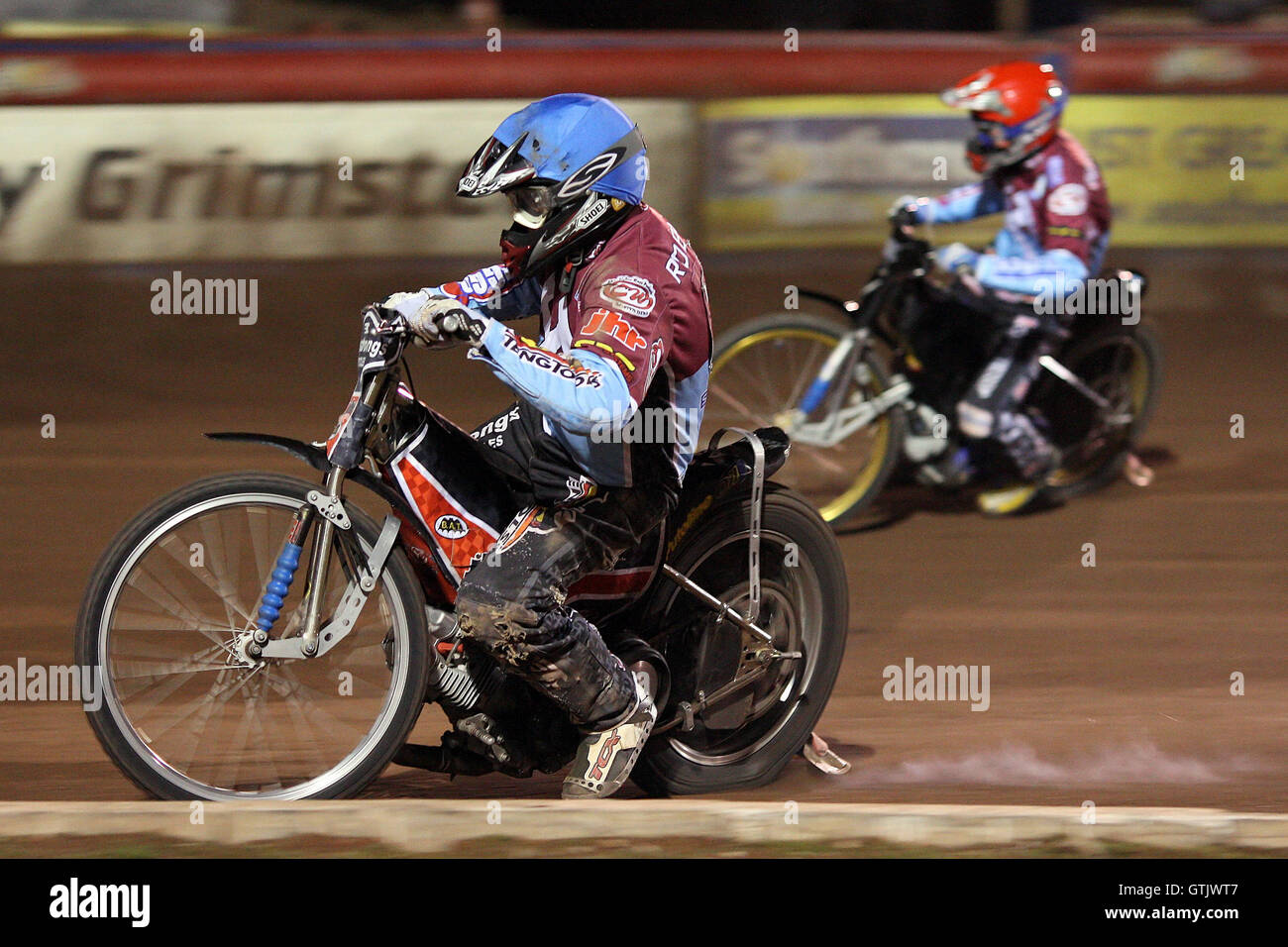 Heat 14: Jonas Davidsson (red) and Stuart Robson on their way to a 5-1 ...