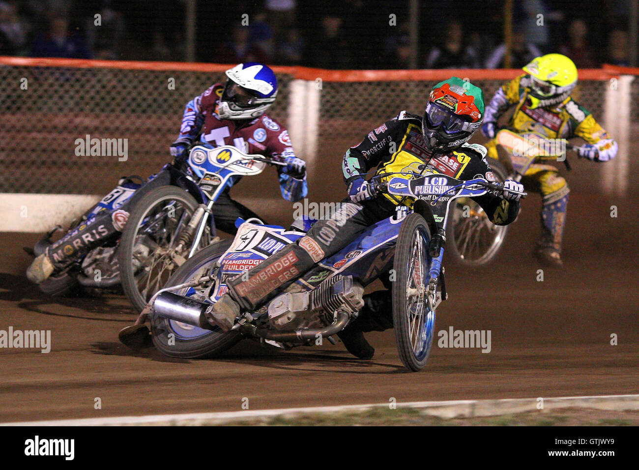 Heat 13: Chris Harris (green), Piotr Swiderski (blue) and Rory Schlein ...