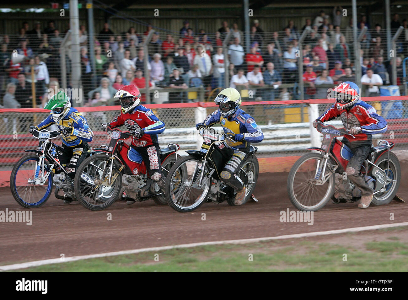 A large crowd watches a speedway meeting between Lakeside Hammers and ...