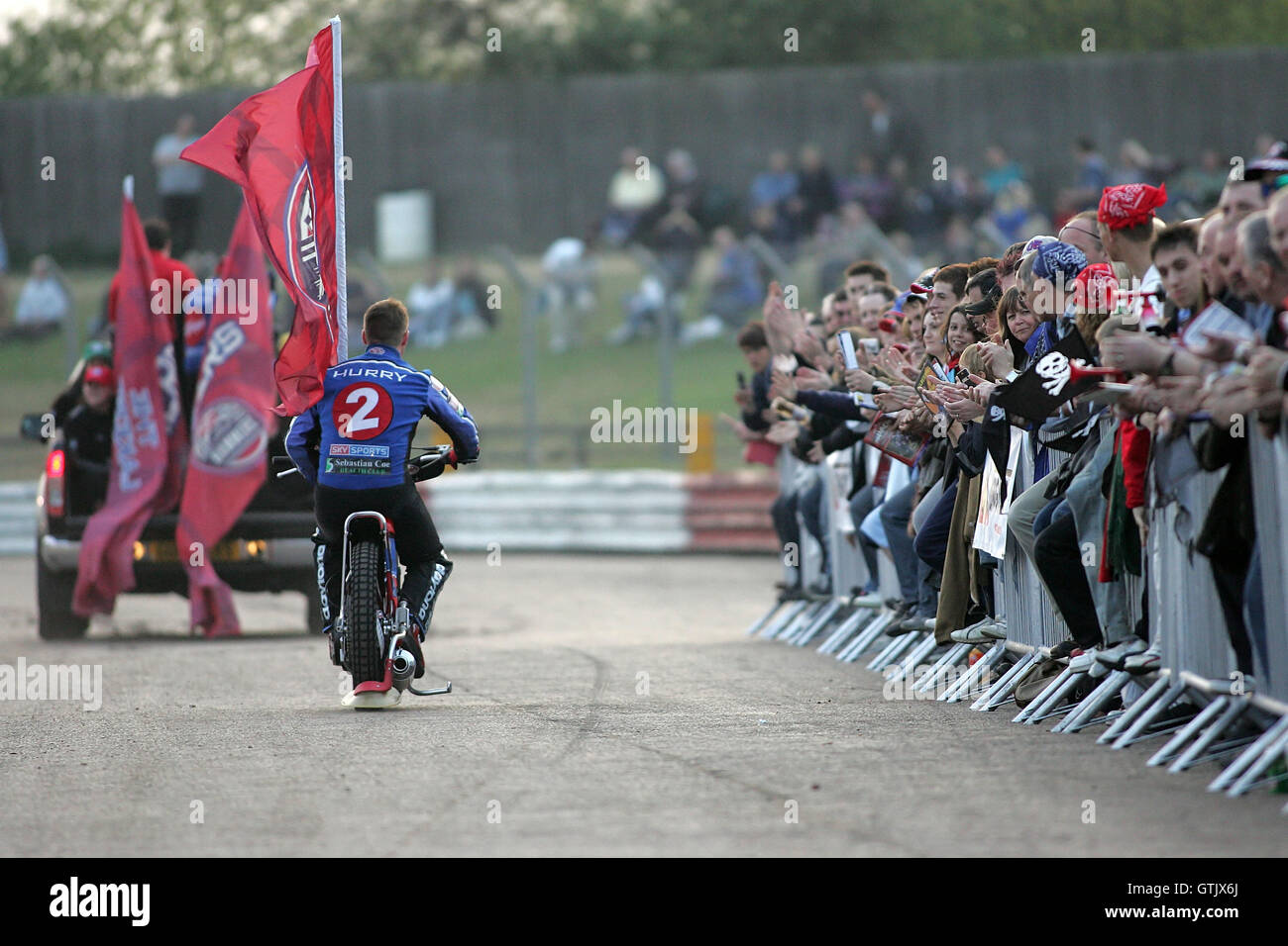 A large crowd watches a speedway meeting between Lakeside Hammers and ...