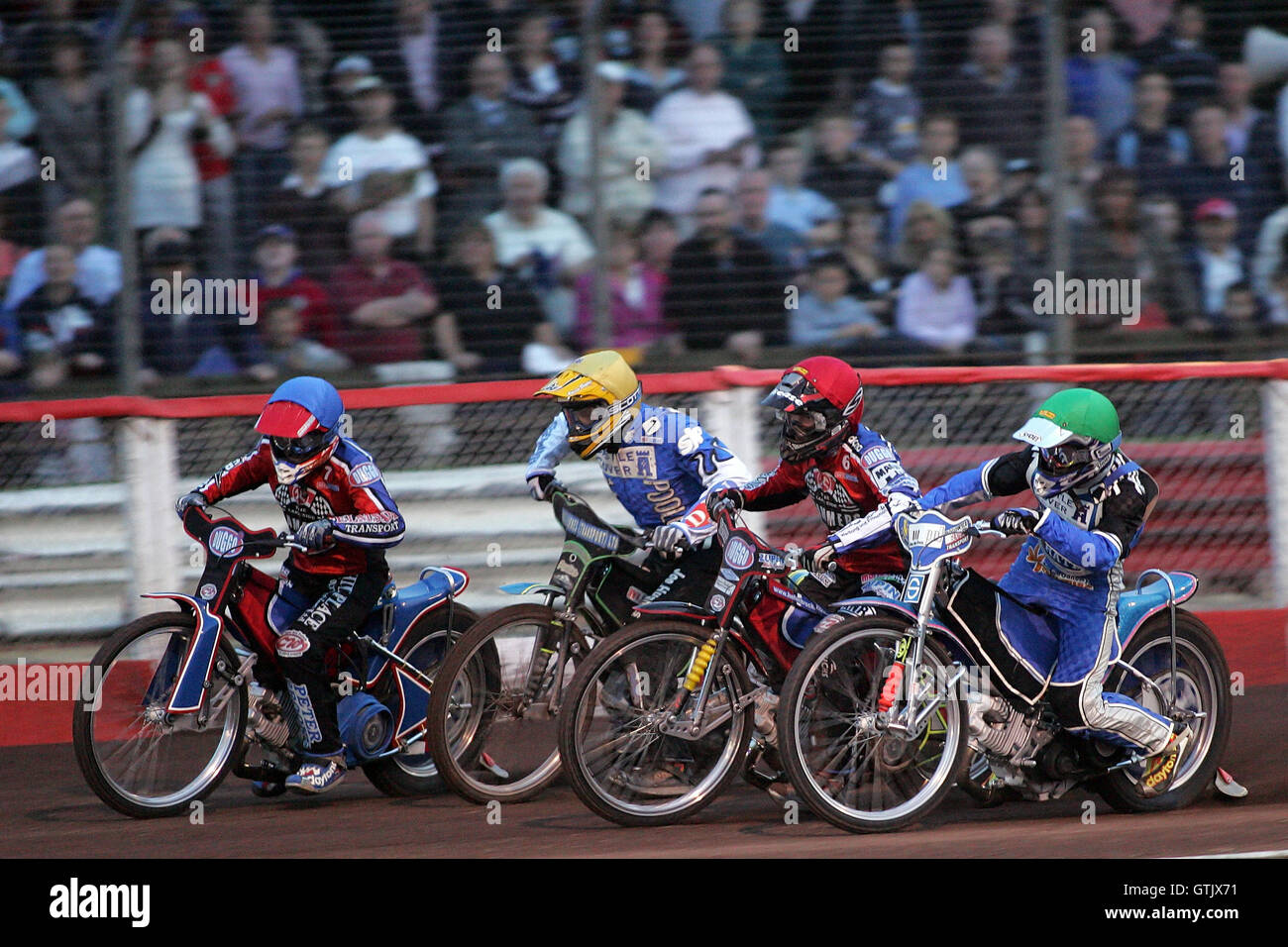 A large crowd watches a speedway meeting between Lakeside Hammers and ...