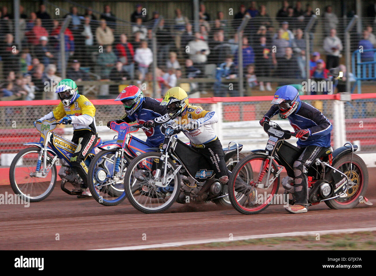 A large crowd watches a speedway meeting between Lakeside Hammers and ...