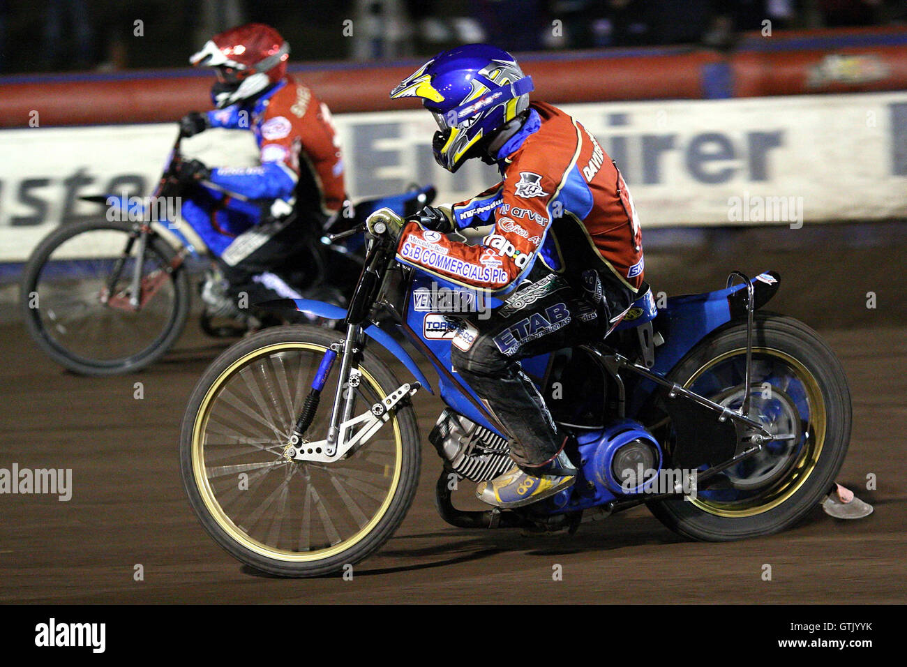 Heat 9: Adam Shields (red) and Jonas Davidsson head for a 5-1 ...