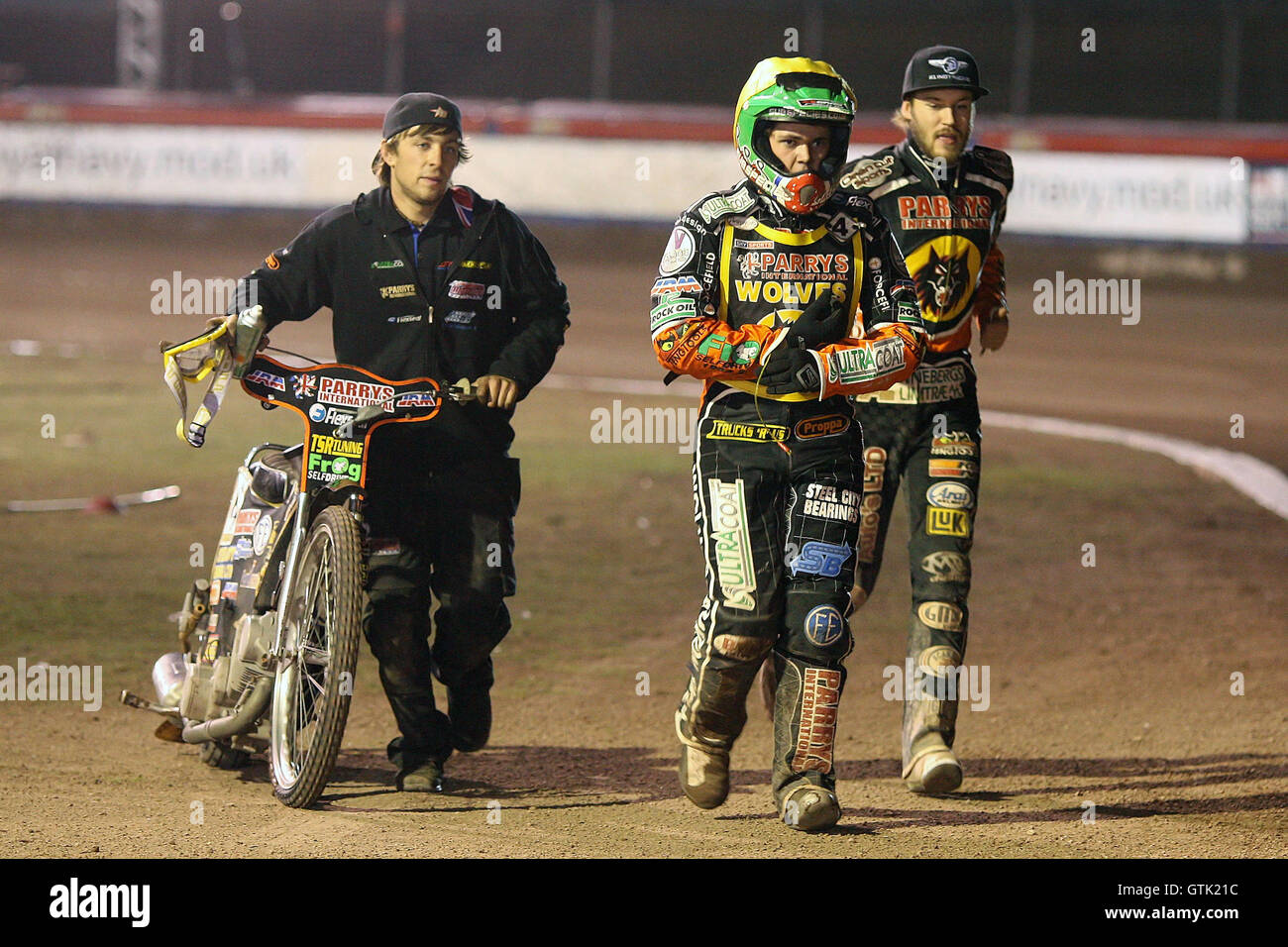 Heat 15: Tai Woffinden (centre) leaves the track after falling in the ...