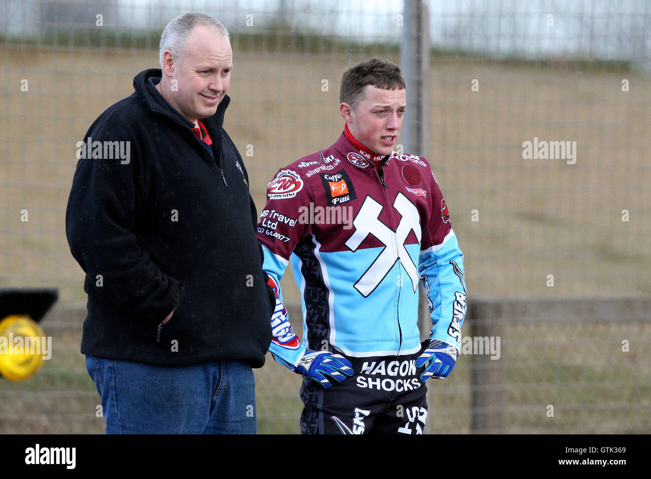 Rob Mear (R) of Lakeside Hammers look on during pre-season speedway ...