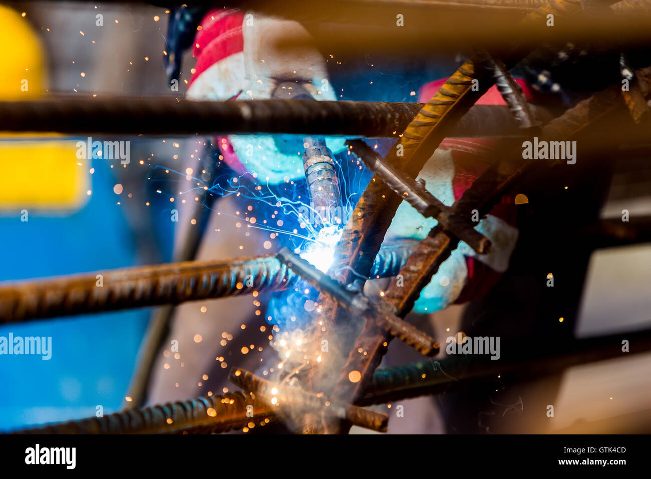 Close up of the hands welder worker with electrode. selective focus ...