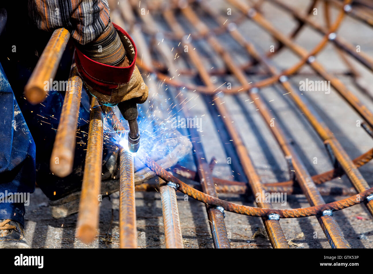 Close up of the hands welder worker with electrode. selective focus ...