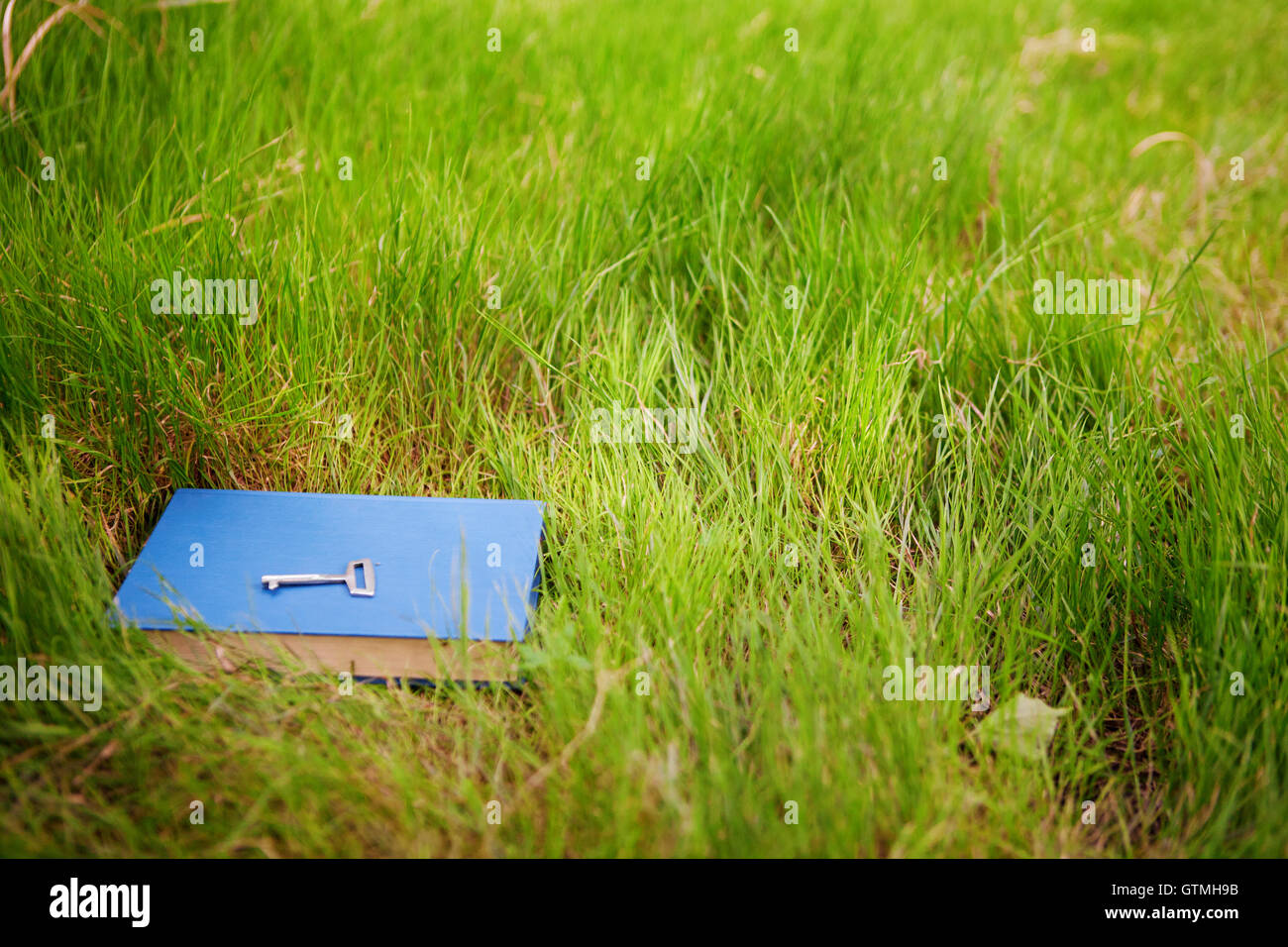key on the book Stock Photo - Alamy