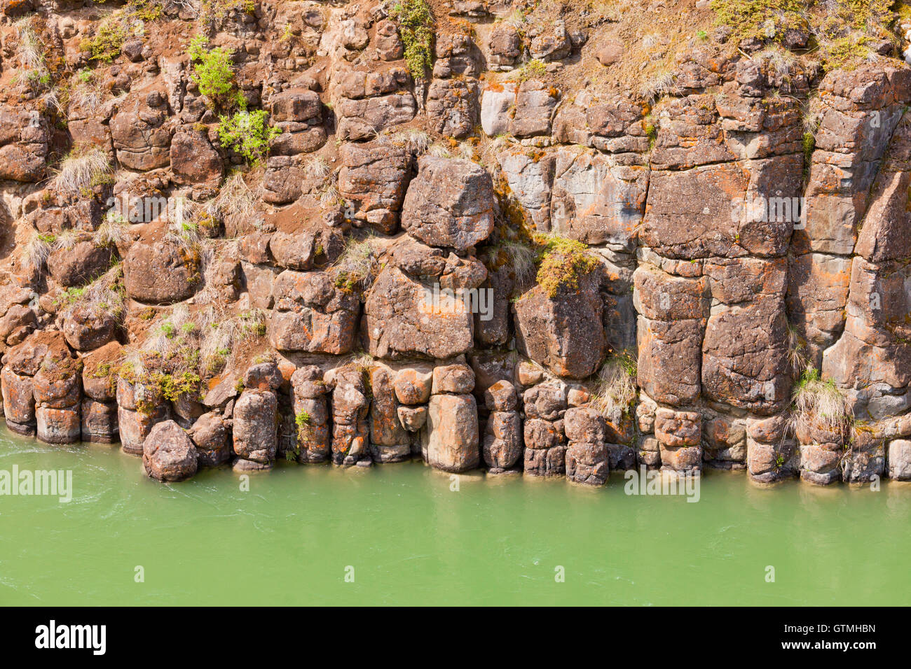 Basalt rock columns of Miles Canyon Yukon Canada Stock Photo - Alamy