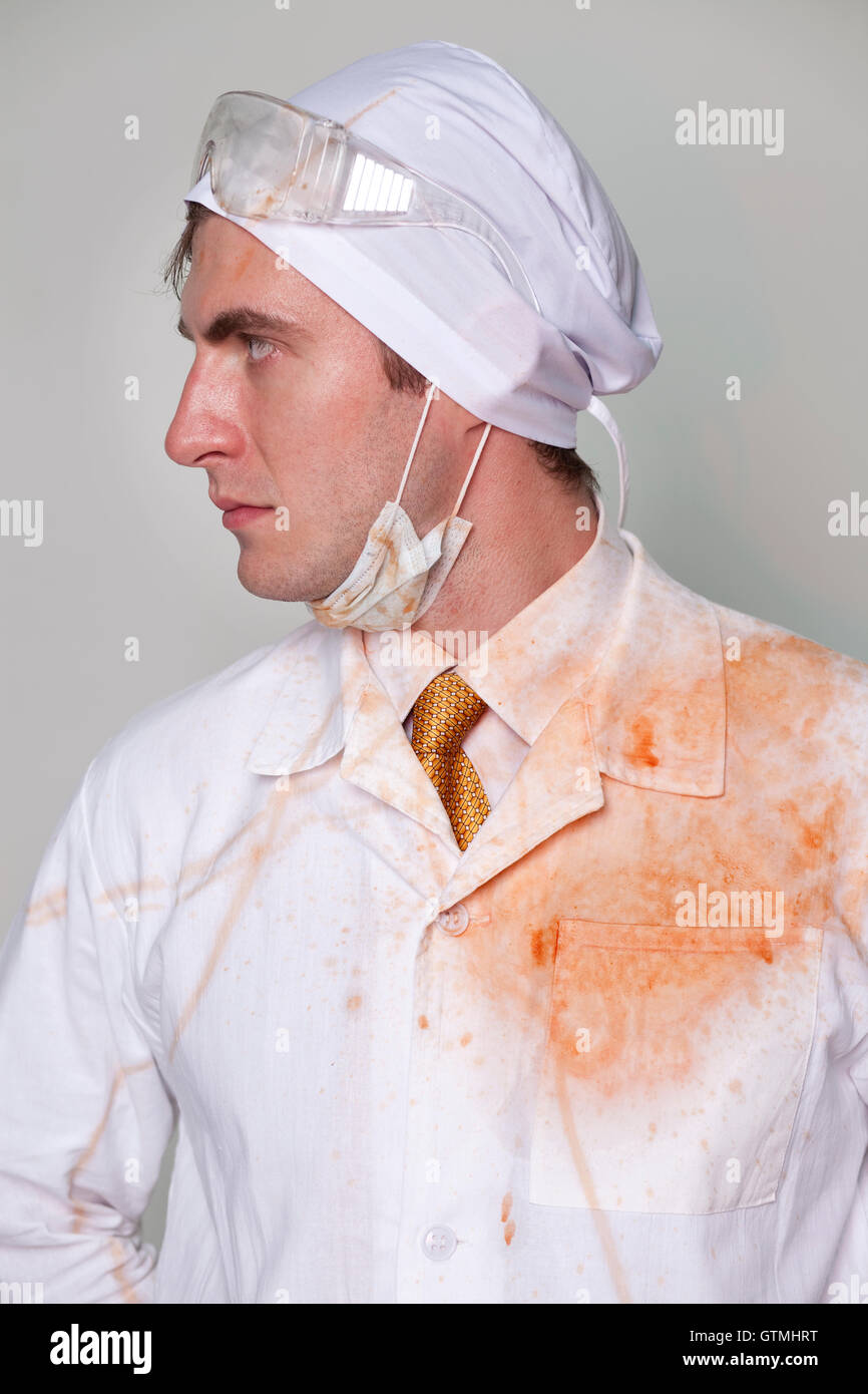 Doctor in a bloody robe Stock Photo - Alamy