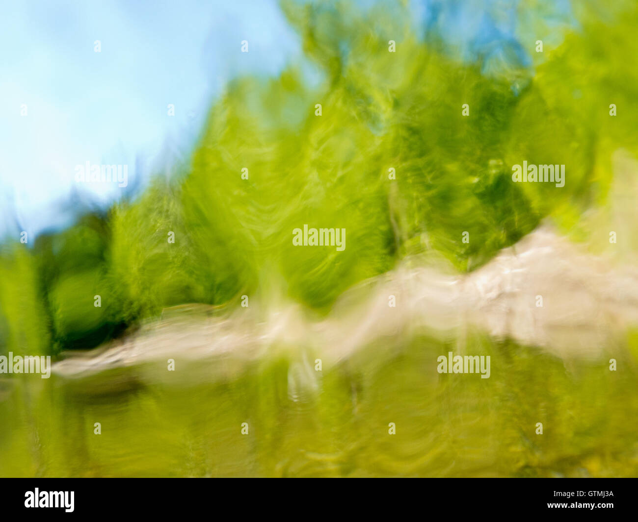 Blurry nature background wavy distorted blue green Stock Photo - Alamy