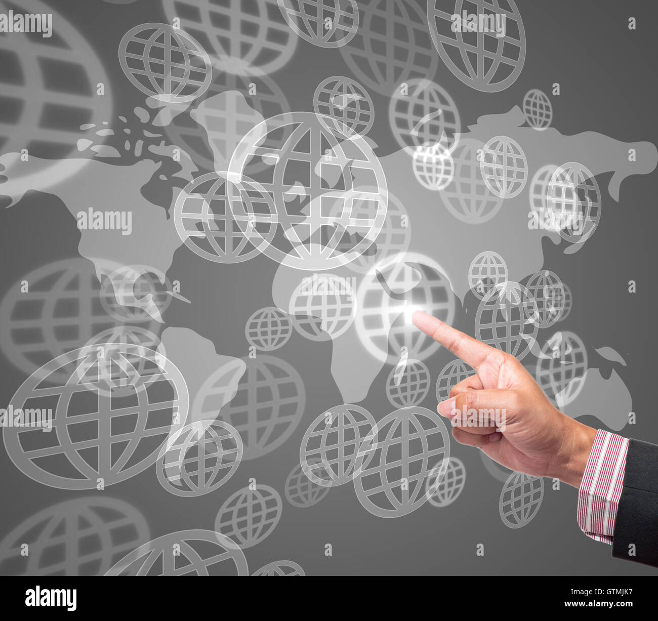 Hand pushing global button on a touch screen interface Stock Photo - Alamy