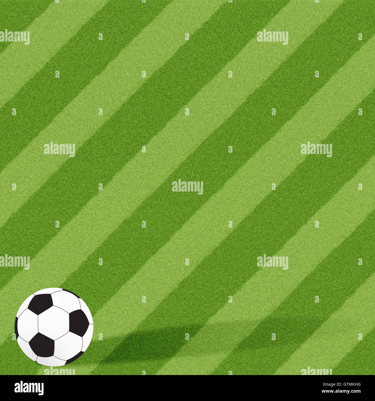 Football soccer on grass background Stock Photo - Alamy