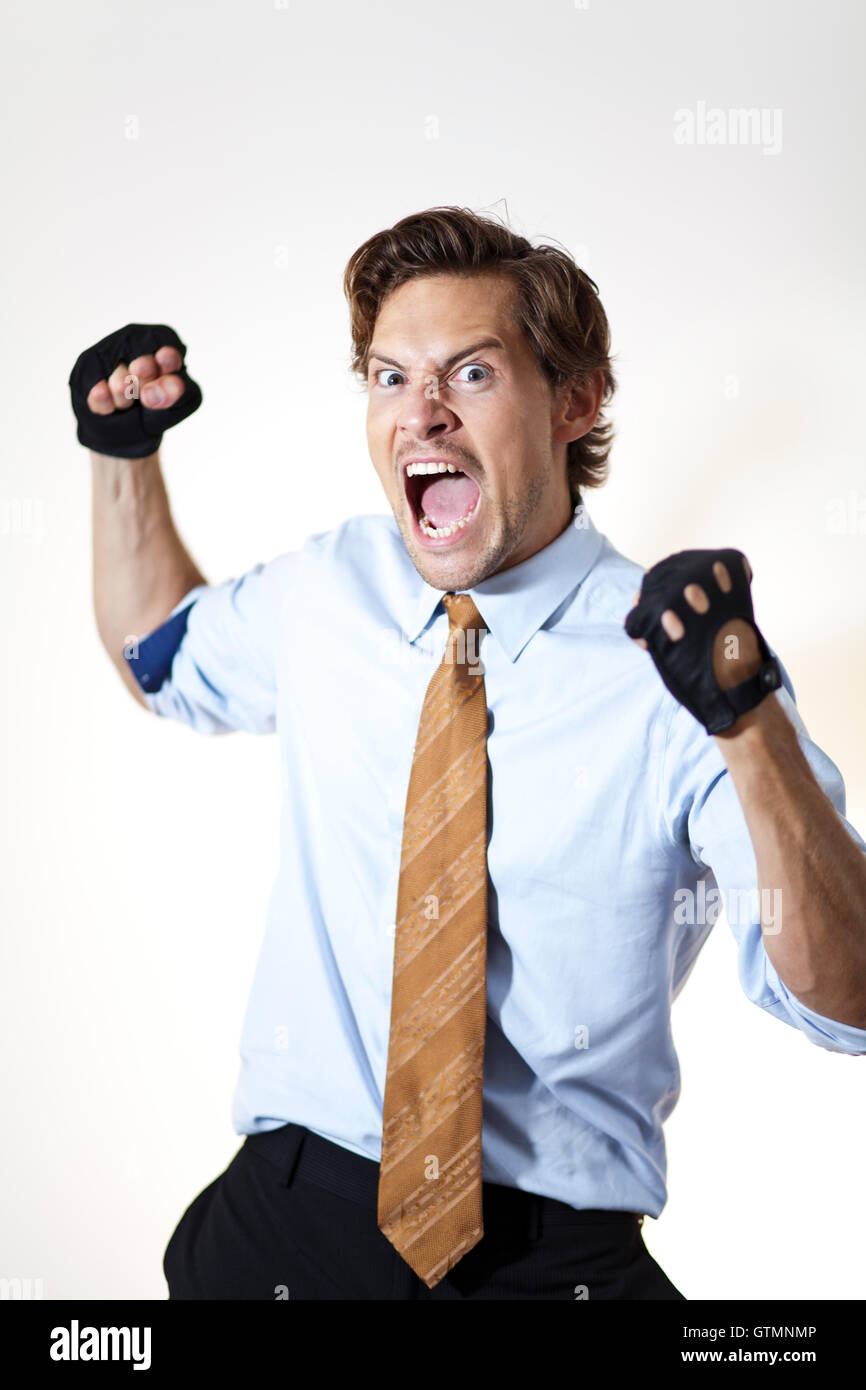 Brutish businessman ready to punch Stock Photo - Alamy