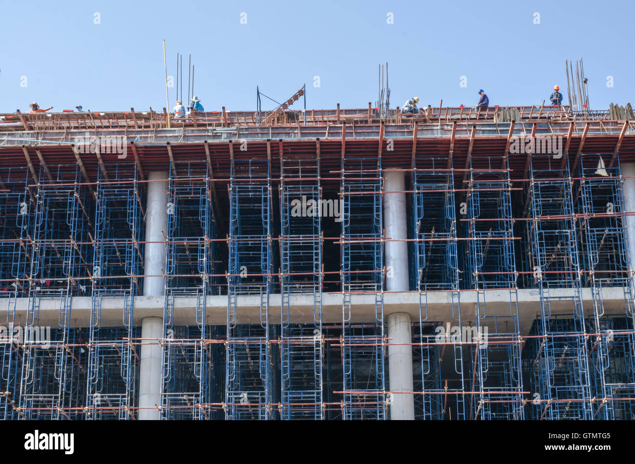construction people makeing buildings Stock Photo - Alamy