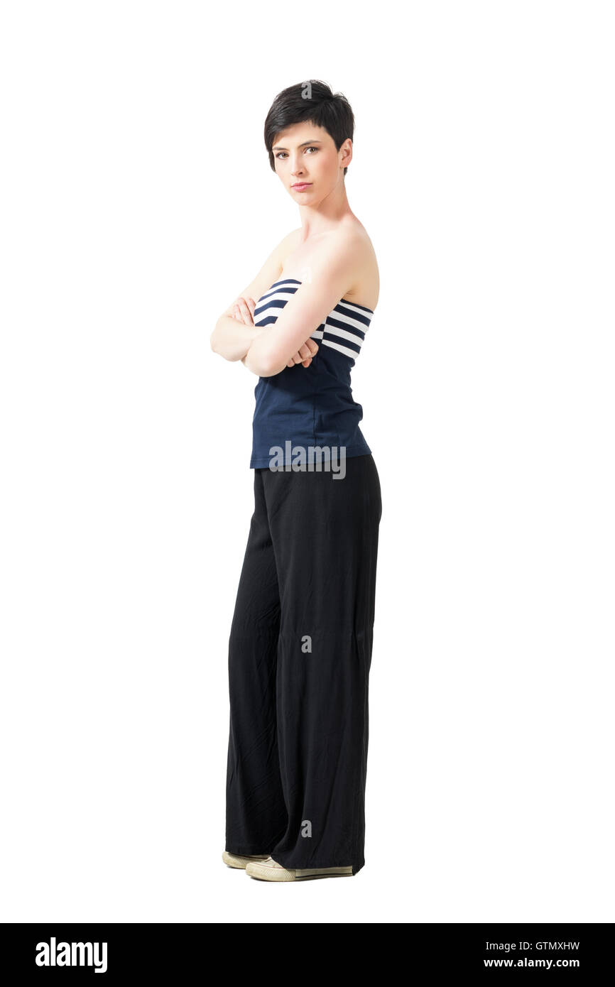 Confident serious short hair woman with crossed arms looking at camera ...