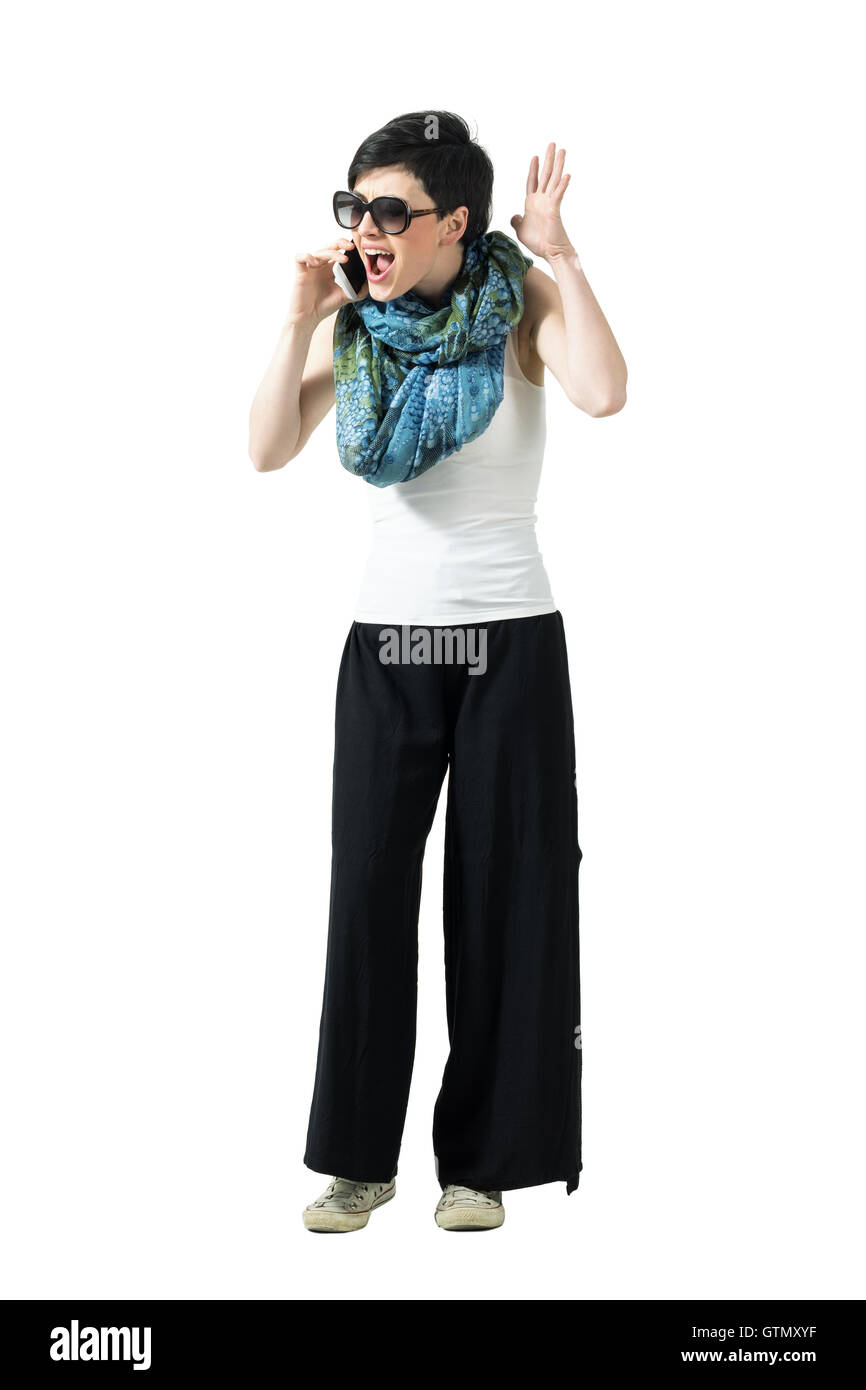 Angry upset casual woman yelling at mobile phone. Full body length ...
