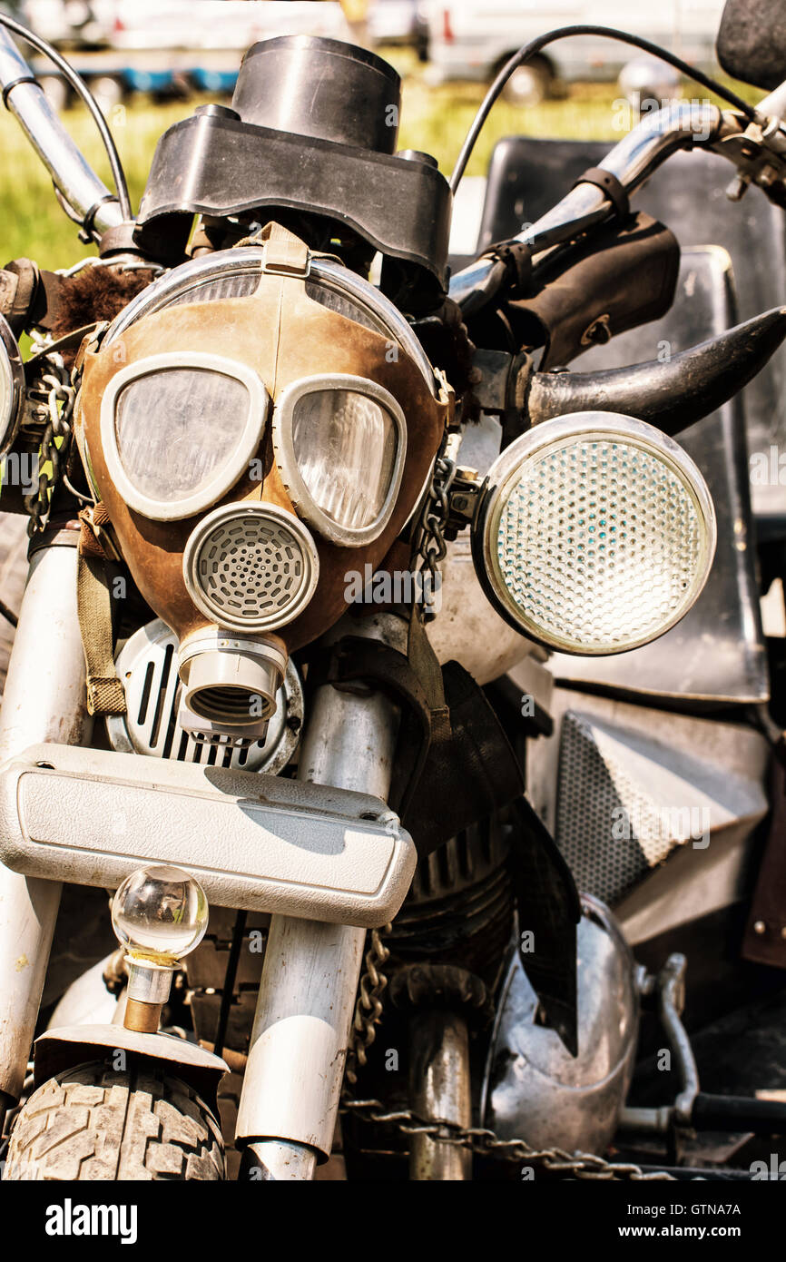 Detail of veteran motorbike with symbolic gas mask. Meeting bikers ...
